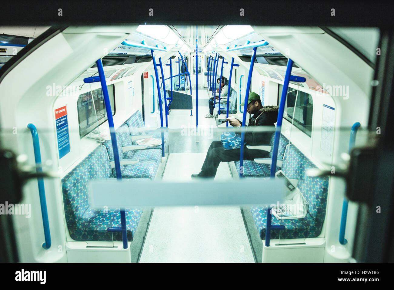Passengers inside the London Underground. It also known as “the Tube ...
