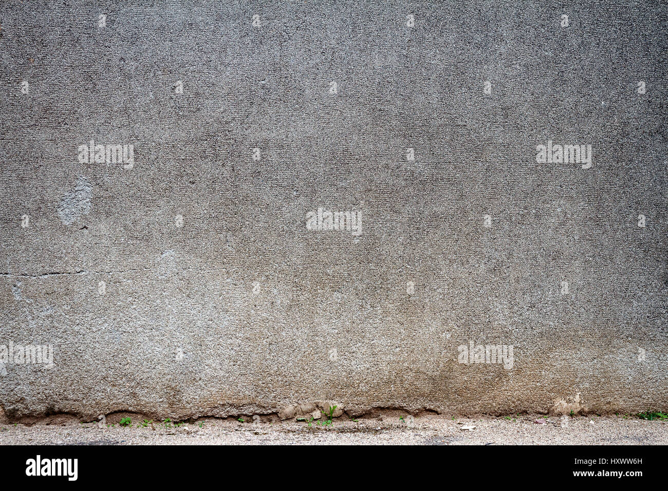 Old weathered gray plaster wall and a ground Stock Photo - Alamy