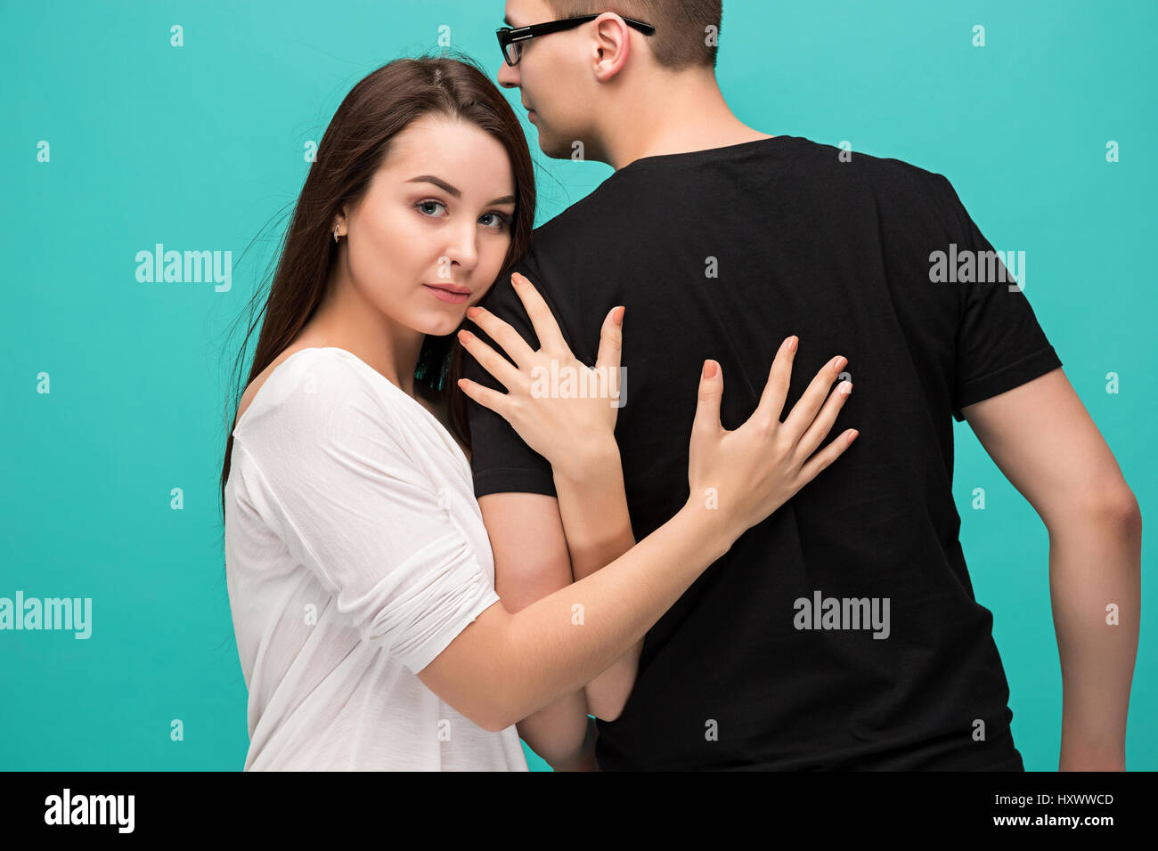 Portrait of couple, close to each other. Caucasian models in love ...