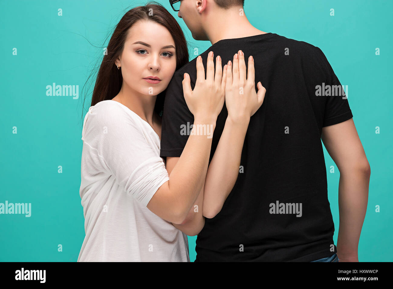 Portrait of couple, close to each other. Caucasian models in love ...
