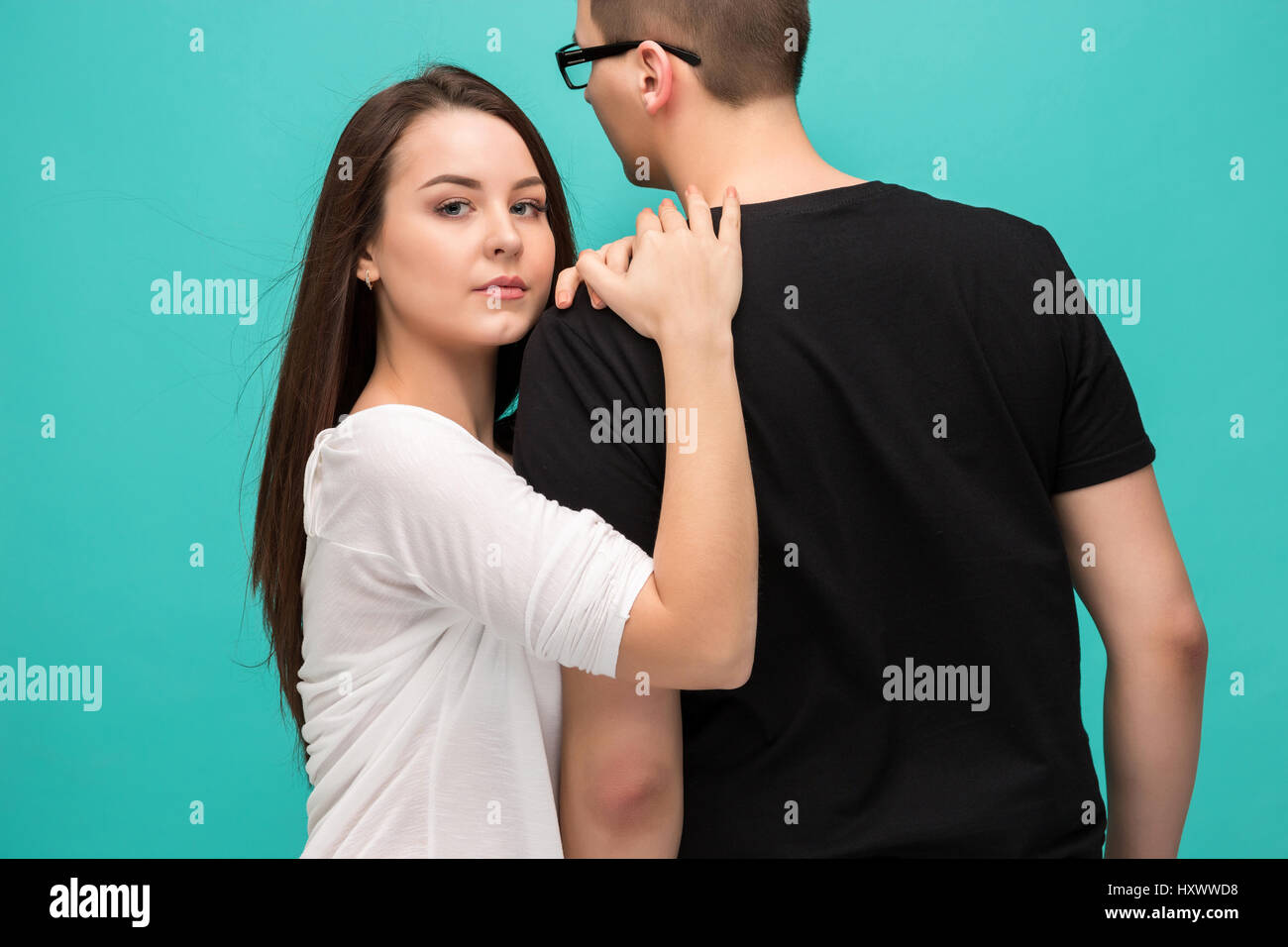 Portrait of couple, close to each other. Caucasian models in love ...