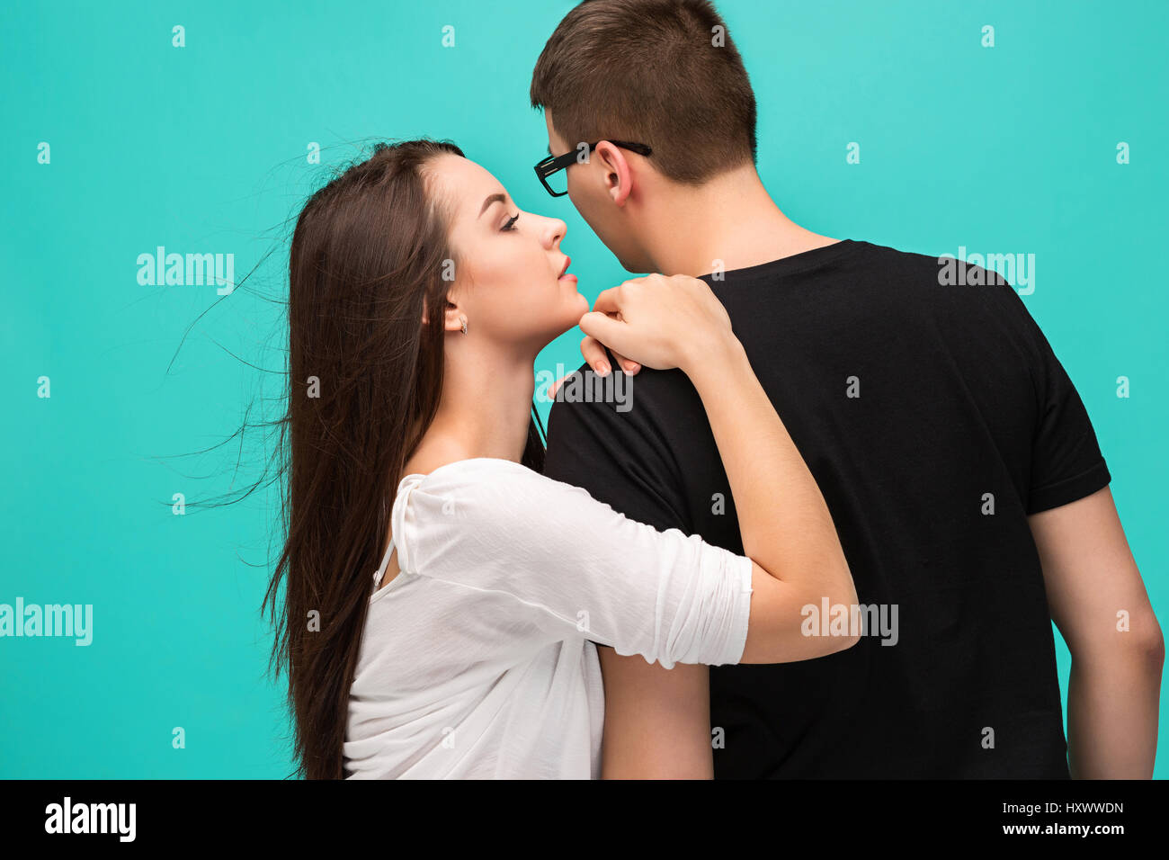 Portrait of couple, close to each other. Caucasian models in love ...