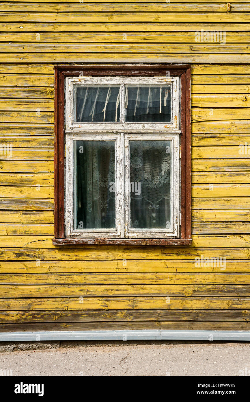 Old window on a aged wooden wall. Architectural detail. Architecture ...