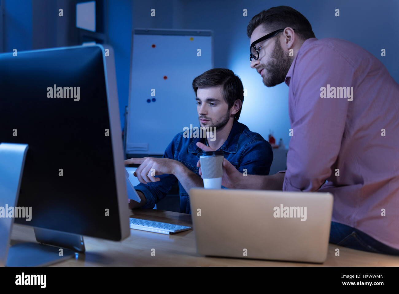 Serious concentrated programmers working on a project Stock Photo - Alamy