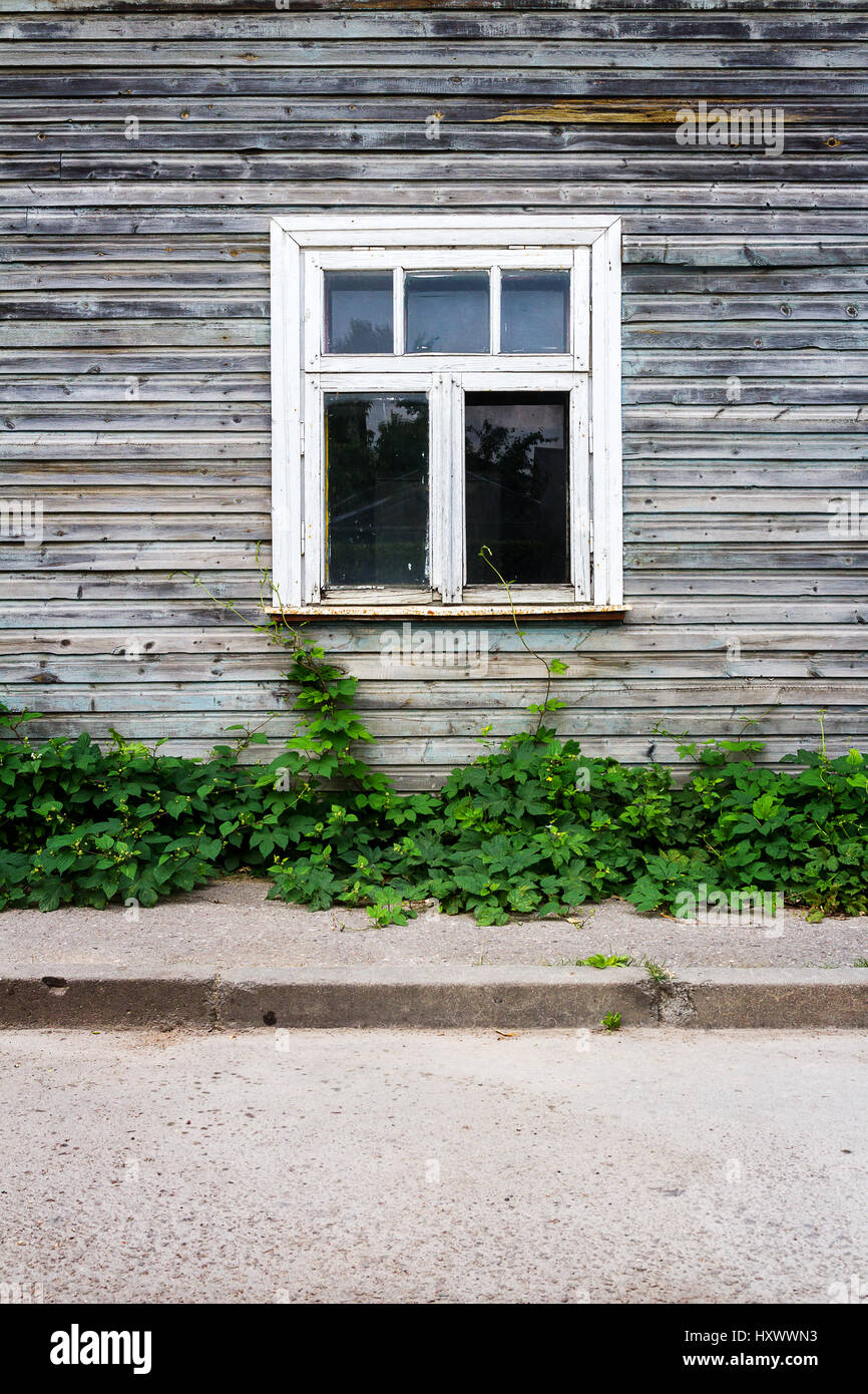Old window on a aged wooden wall. Architectural detail. Architecture ...