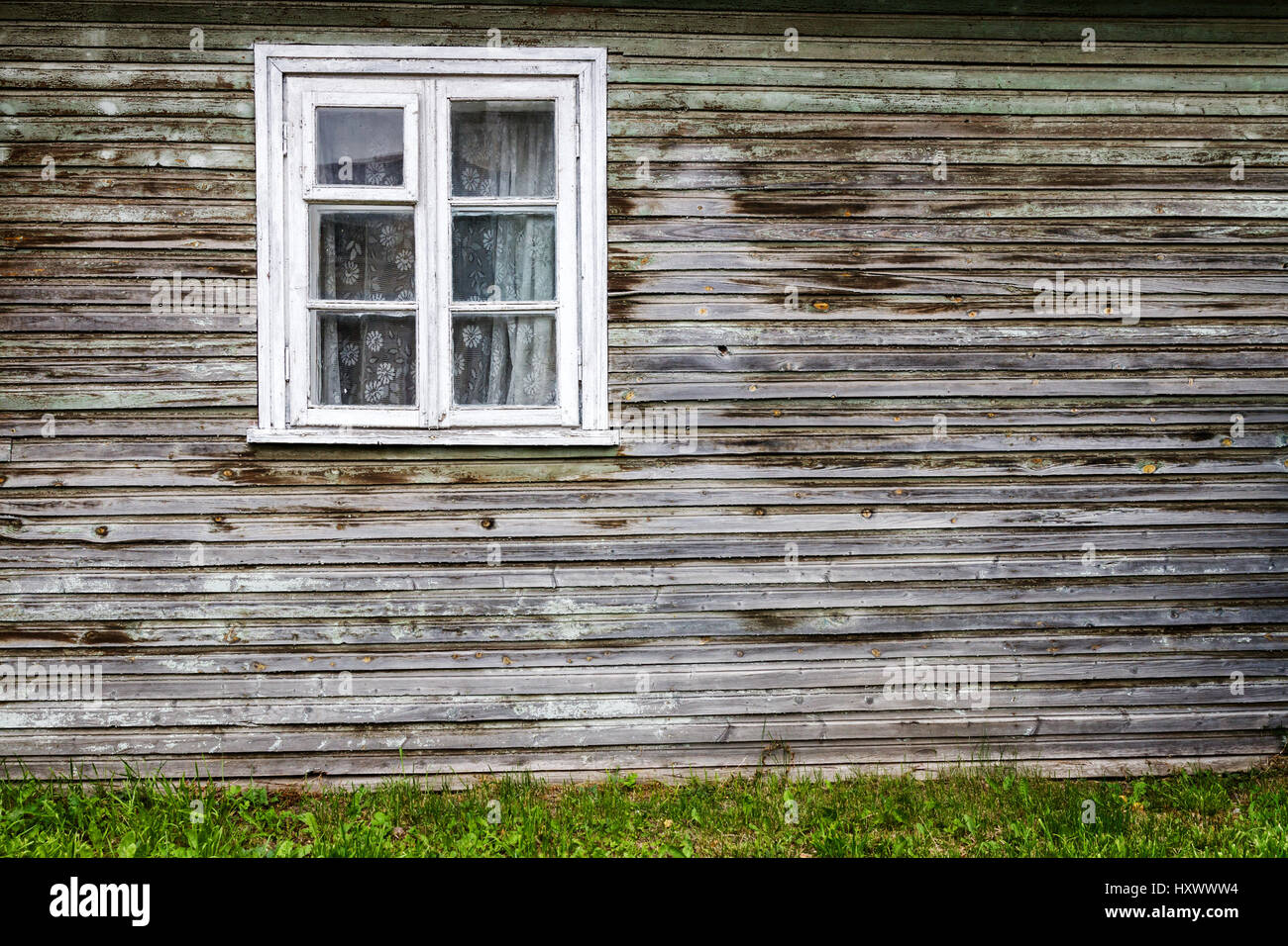 Old window on a aged wooden wall. Architectural detail. Architecture ...