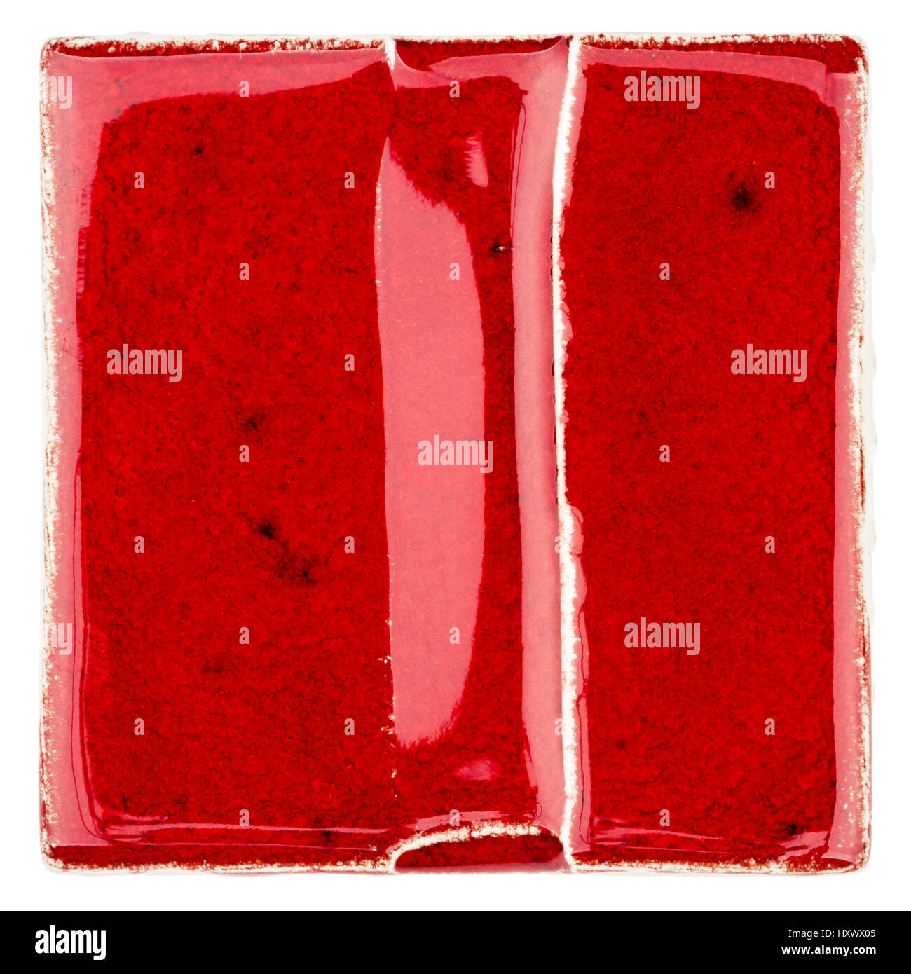 Red lined handmade glazed ceramic tile isolated on white background ...