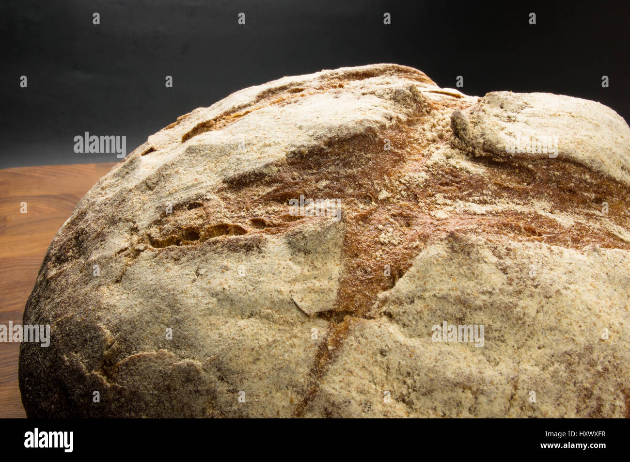 cut malt bread handmade on wooden background Stock Photo - Alamy