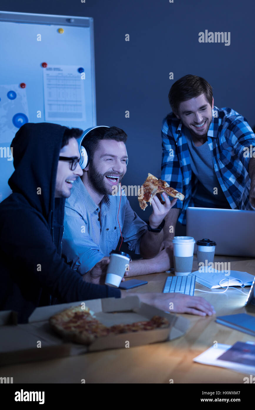 Male colleagues laughing computer hi-res stock photography and images ...