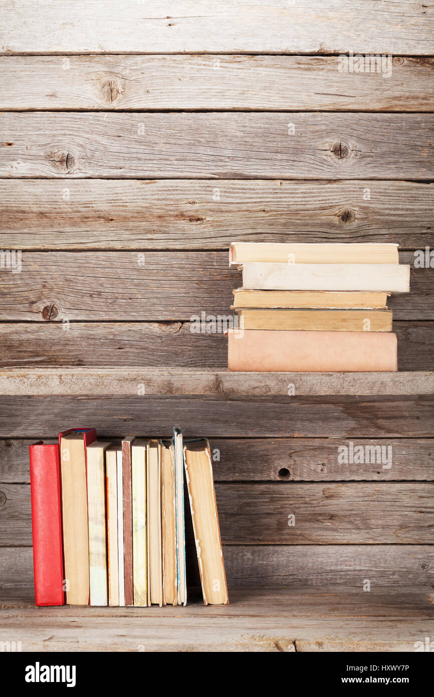 Old books on a wooden shelf. With empty space Stock Photo - Alamy