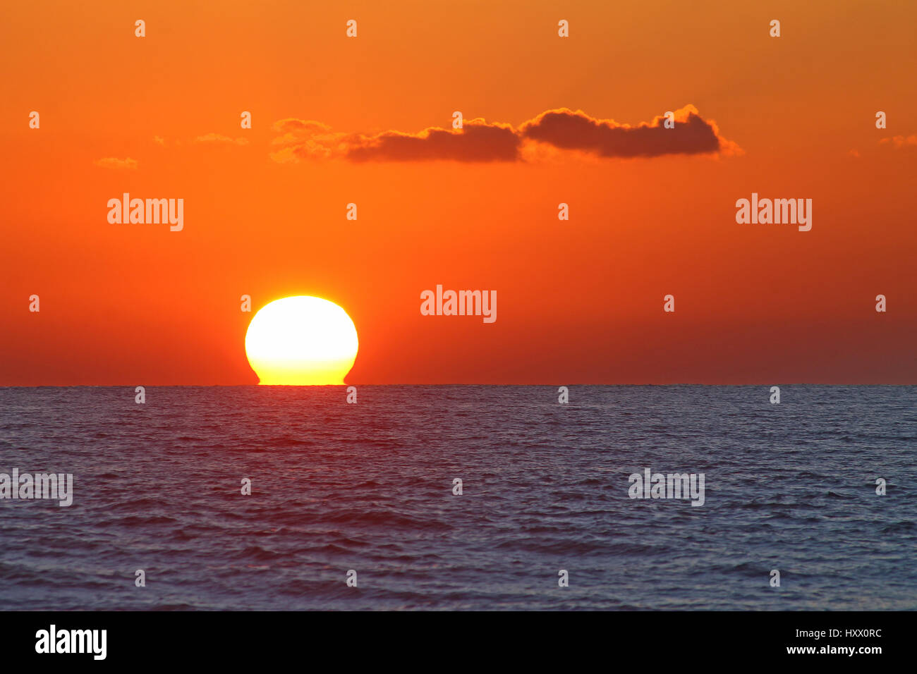 Beautiful sunset sun touching hi-res stock photography and images - Alamy