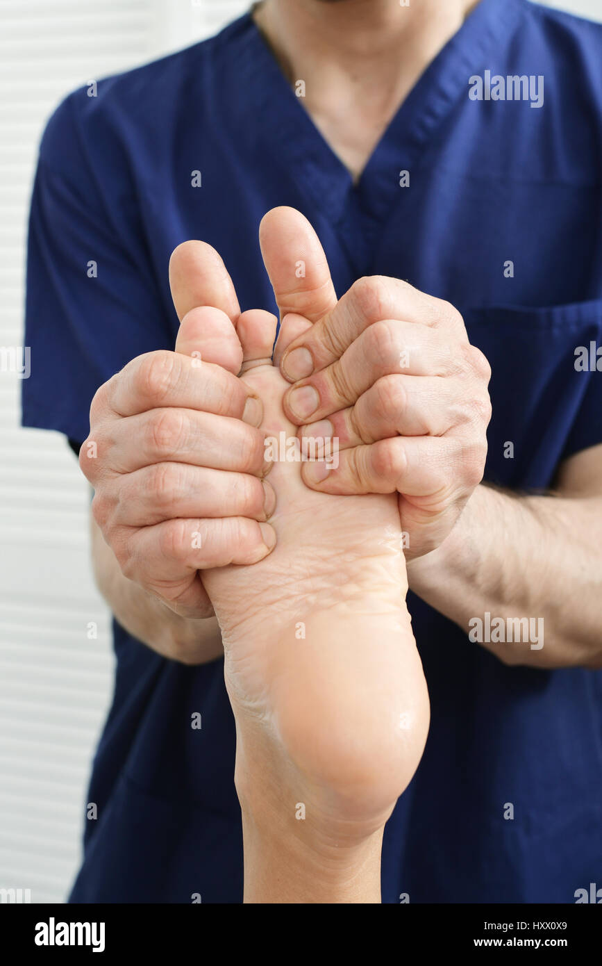 Massage male foot hi-res stock photography and images - Alamy
