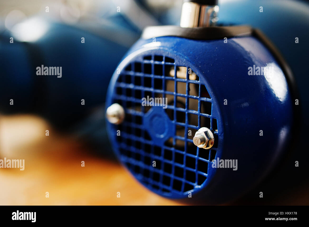 New blue electric motor at work Stock Photo - Alamy