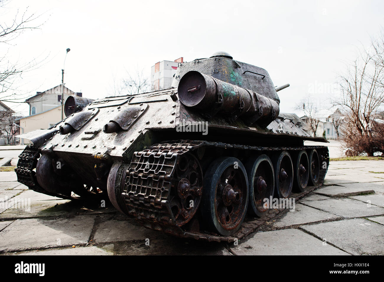 Old vintage military tank in the city pedestal Stock Photo - Alamy