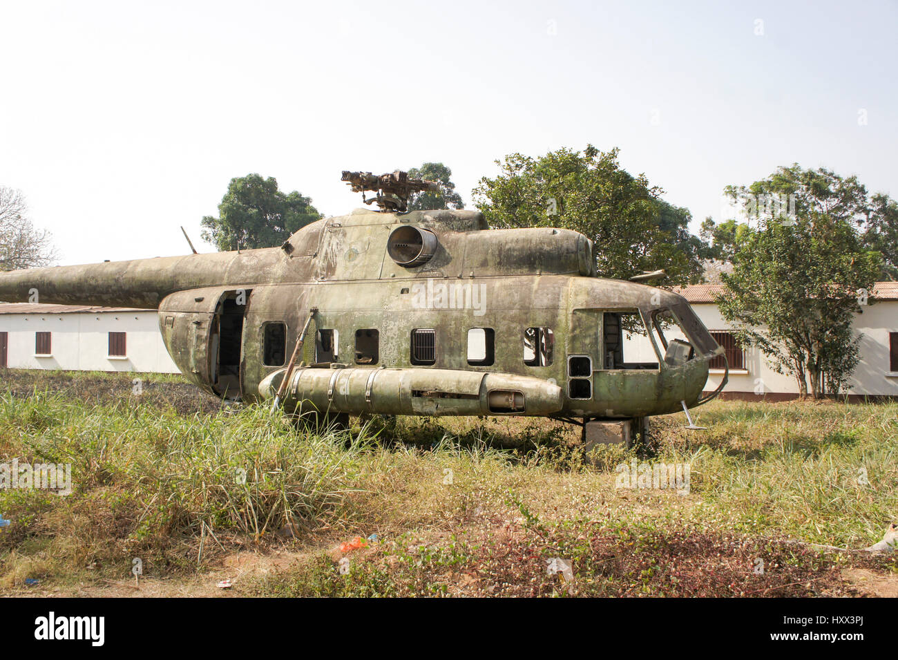 A wrecked helicopter at Camp Kassai, a military base east of Bangui in ...