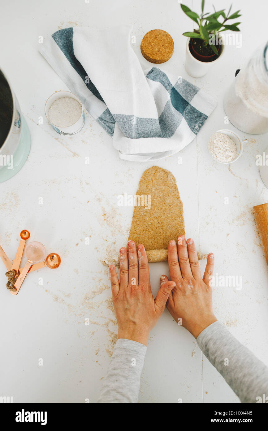 Girl making bread rolls Stock Photo - Alamy