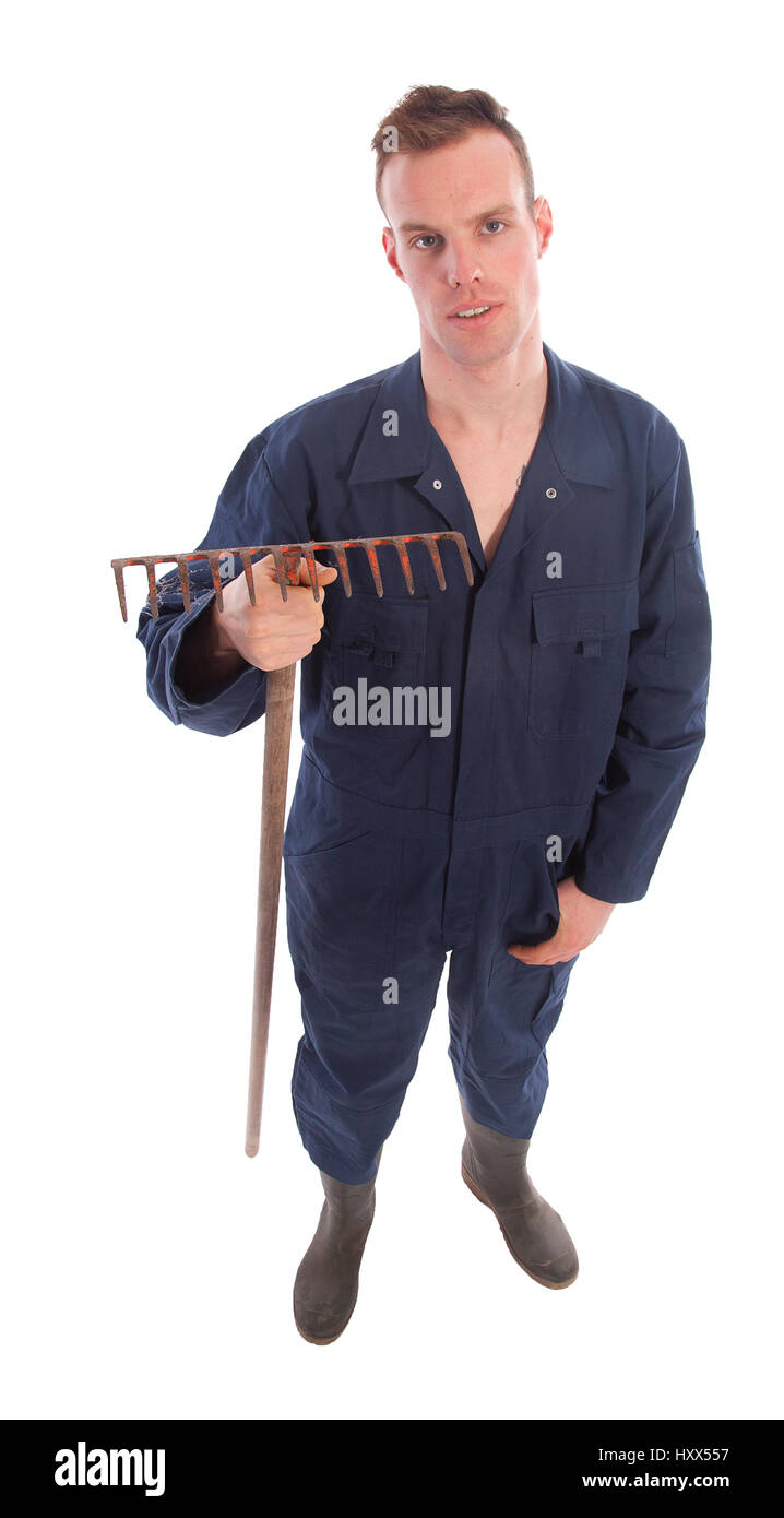Young farmer with rake isolated on white background Stock Photo - Alamy