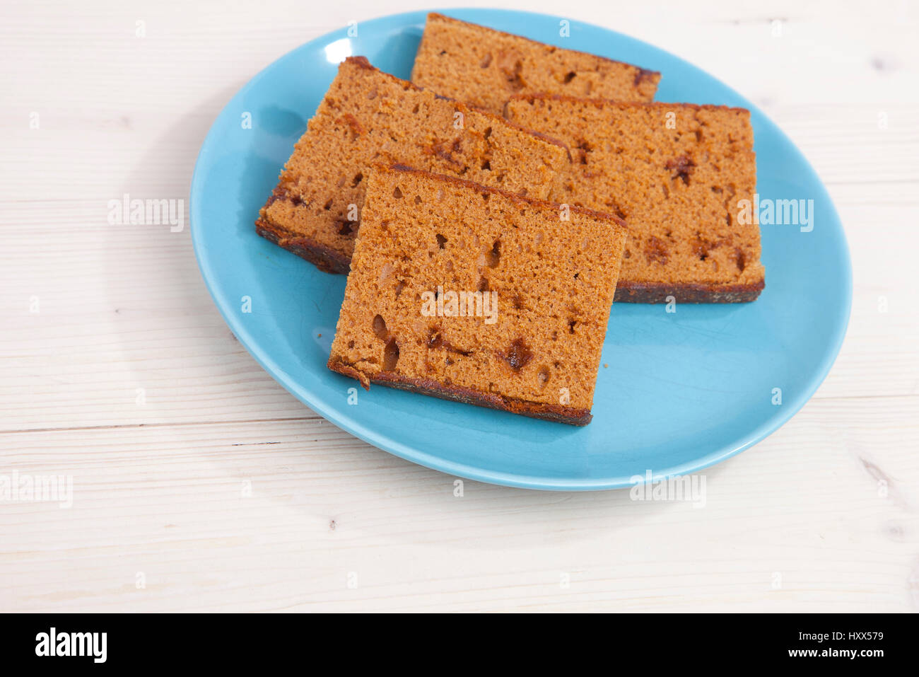 Traditional Dutch cake Ontbijtkoek on wooden background Stock Photo - Alamy