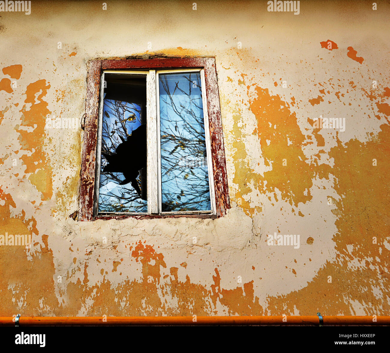Abandoned building detail with broken window Stock Photo - Alamy