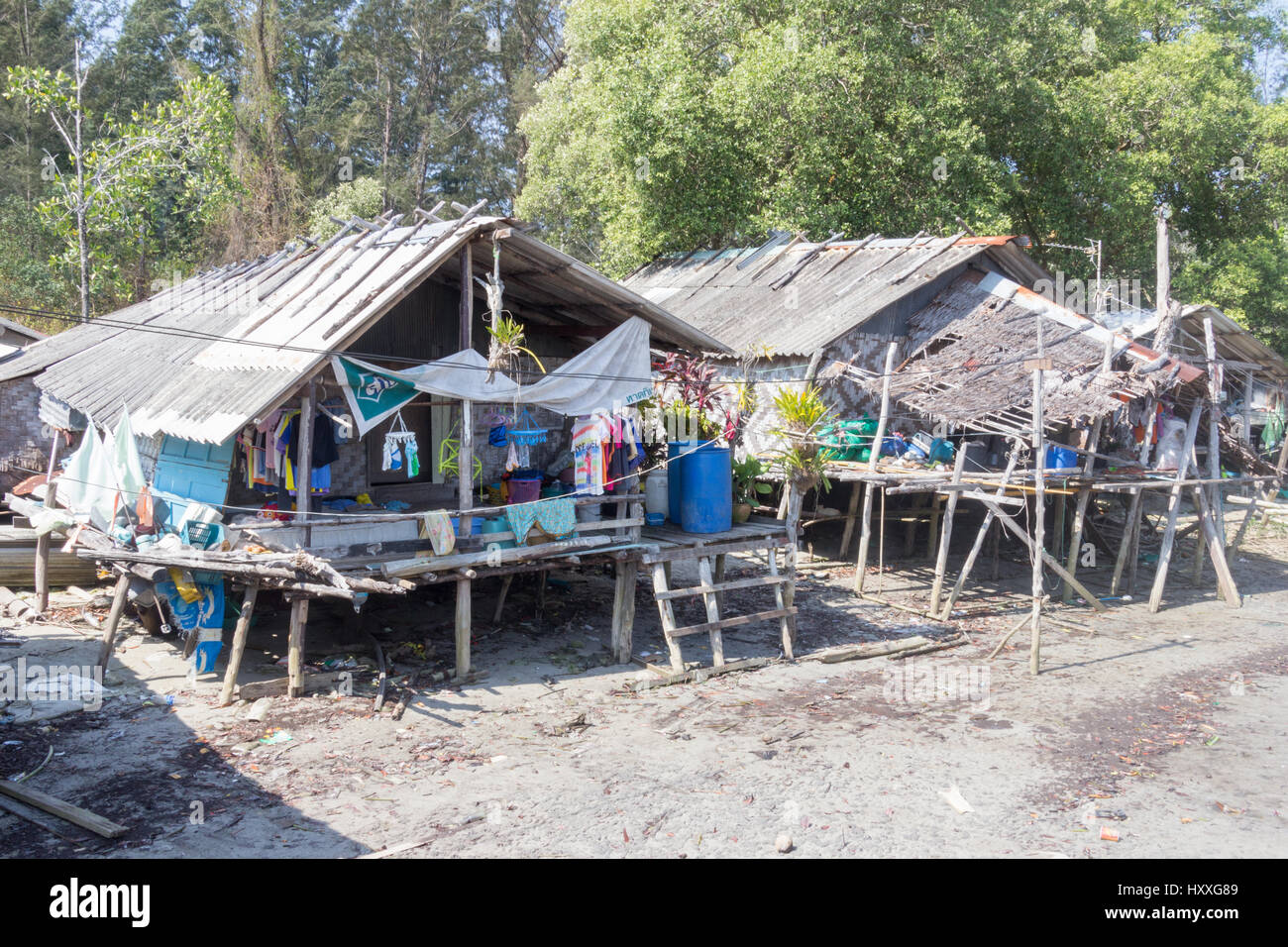 Sea gypsy house with birds in cages in Saladan, Koh Lanta, Krabi ...