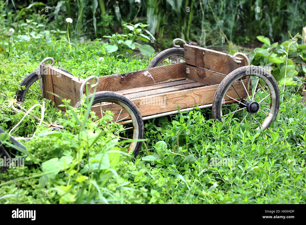 Old Wooden Wheelbarrow High Resolution Stock Photography and Images - Alamy