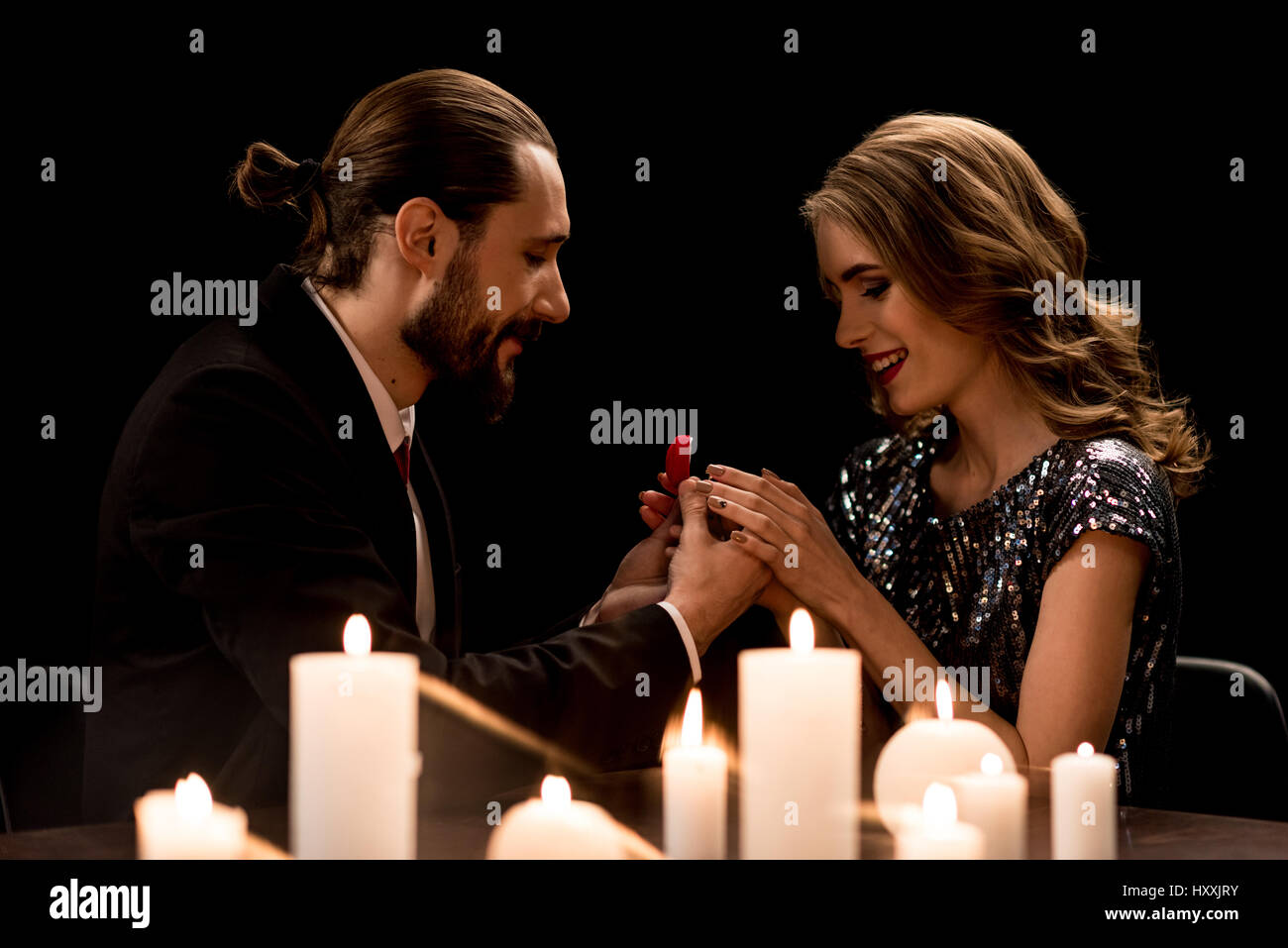 Woman ring candles hi-res stock photography and images - Alamy