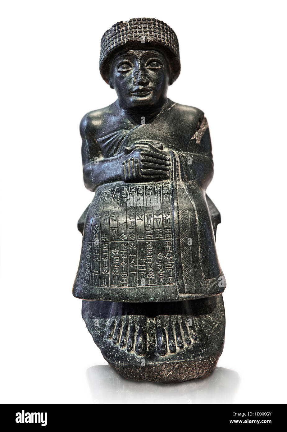 Black diorite statue of Guidea who ruled Lagash from around 2150 BC ...