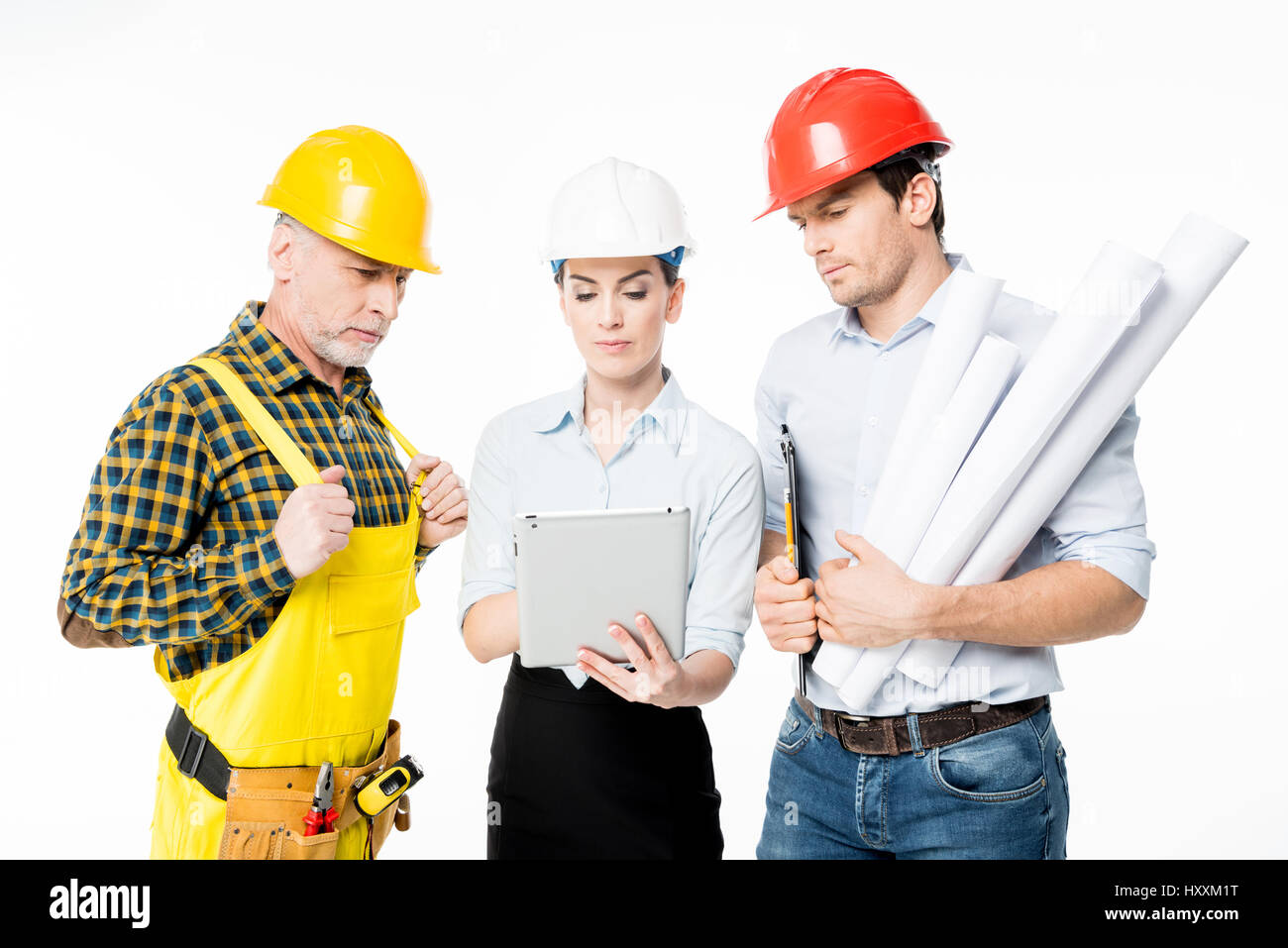 Builders digital tablet looking blueprints hi-res stock photography and ...