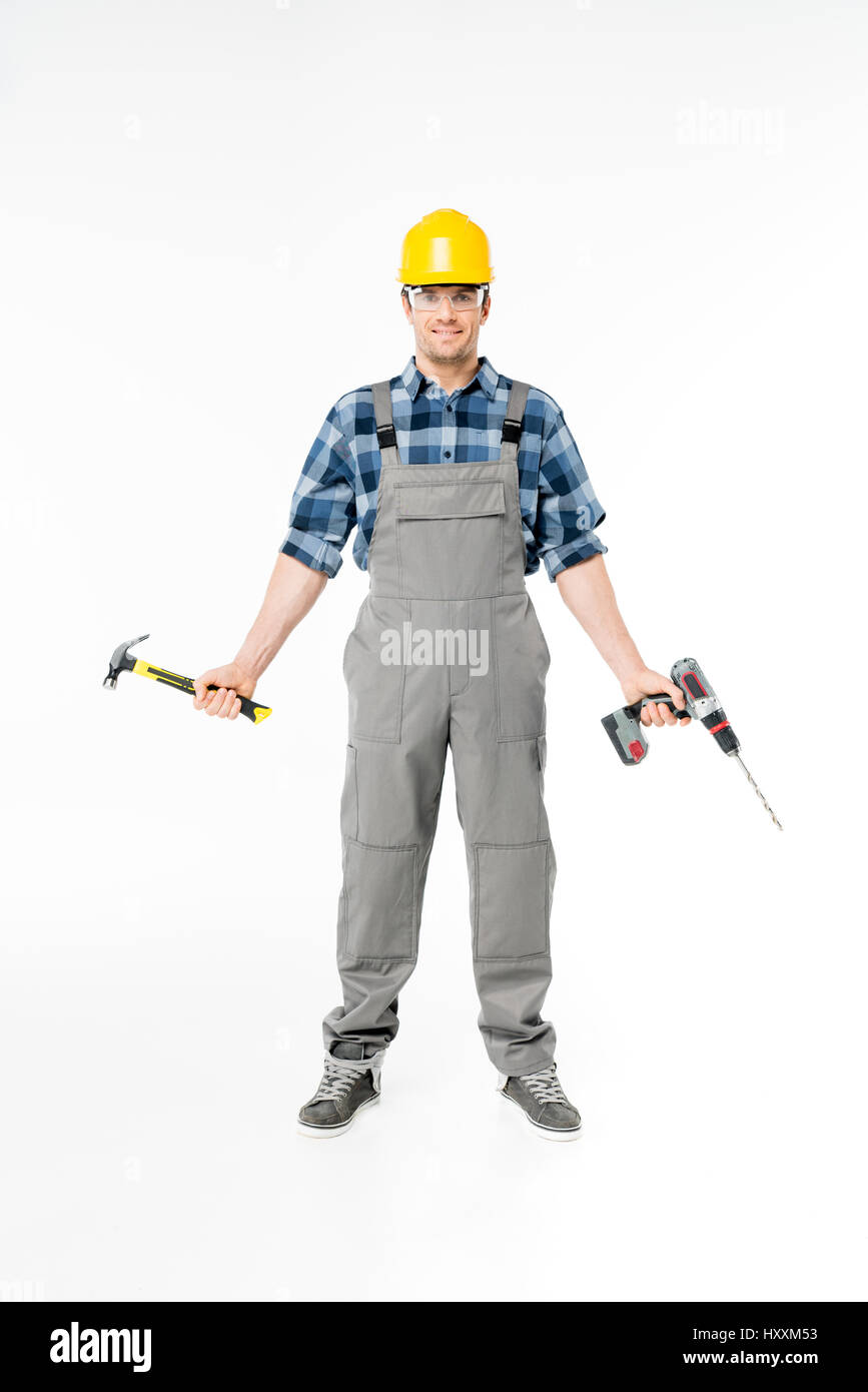 Professional male construction worker in helmet and protective eyewear ...