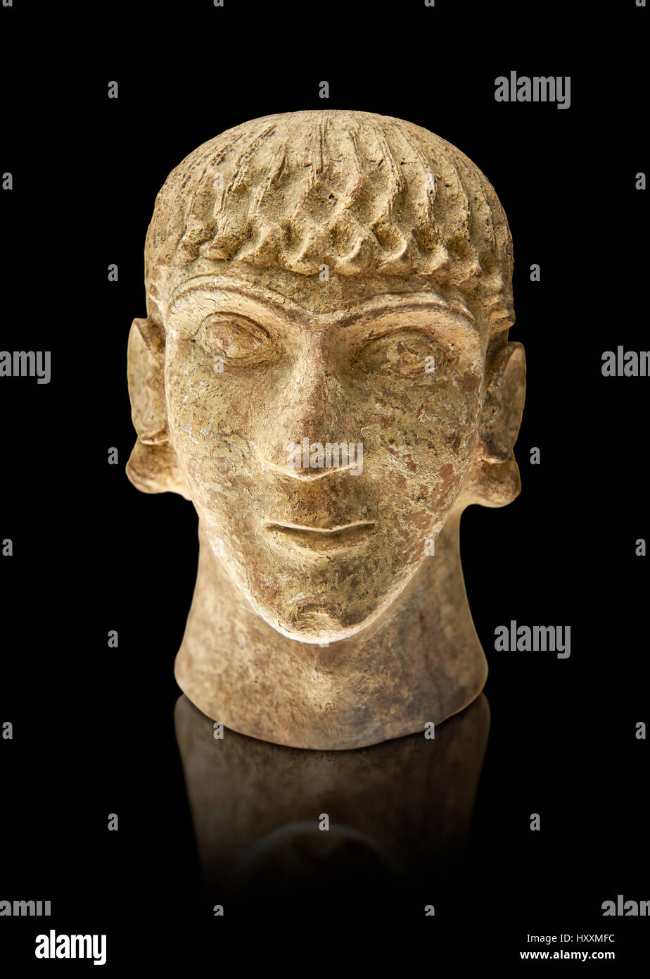 First half of the 6th century B.C Etruscan clay head of a young man ...