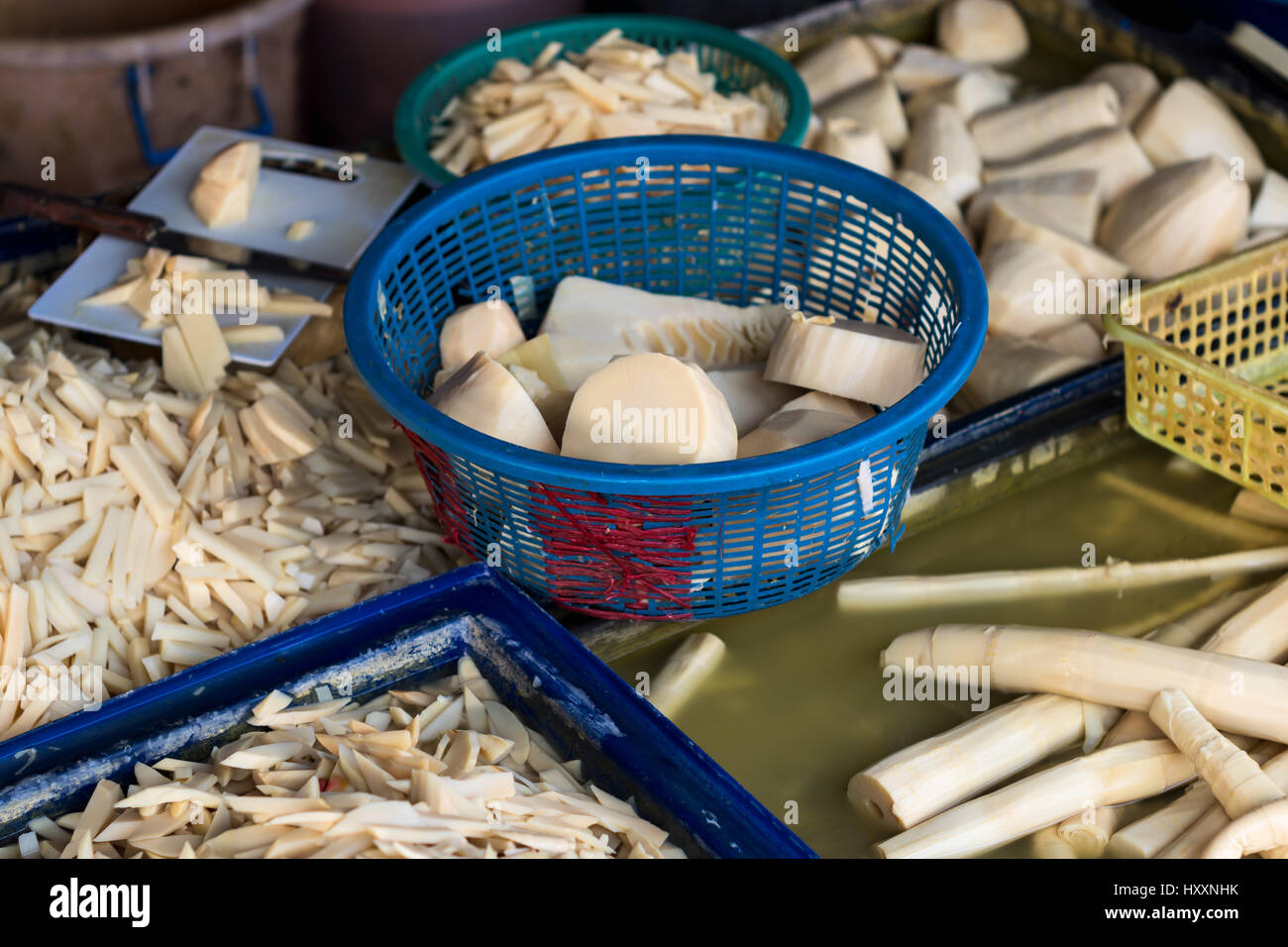 Variety of fresh edible cut, chopped, whole, and sliced raw bamboo for ...
