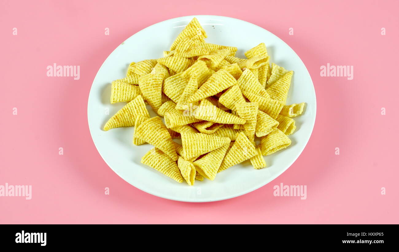 Corn snack, American style. The triangle snack made from some corn ...