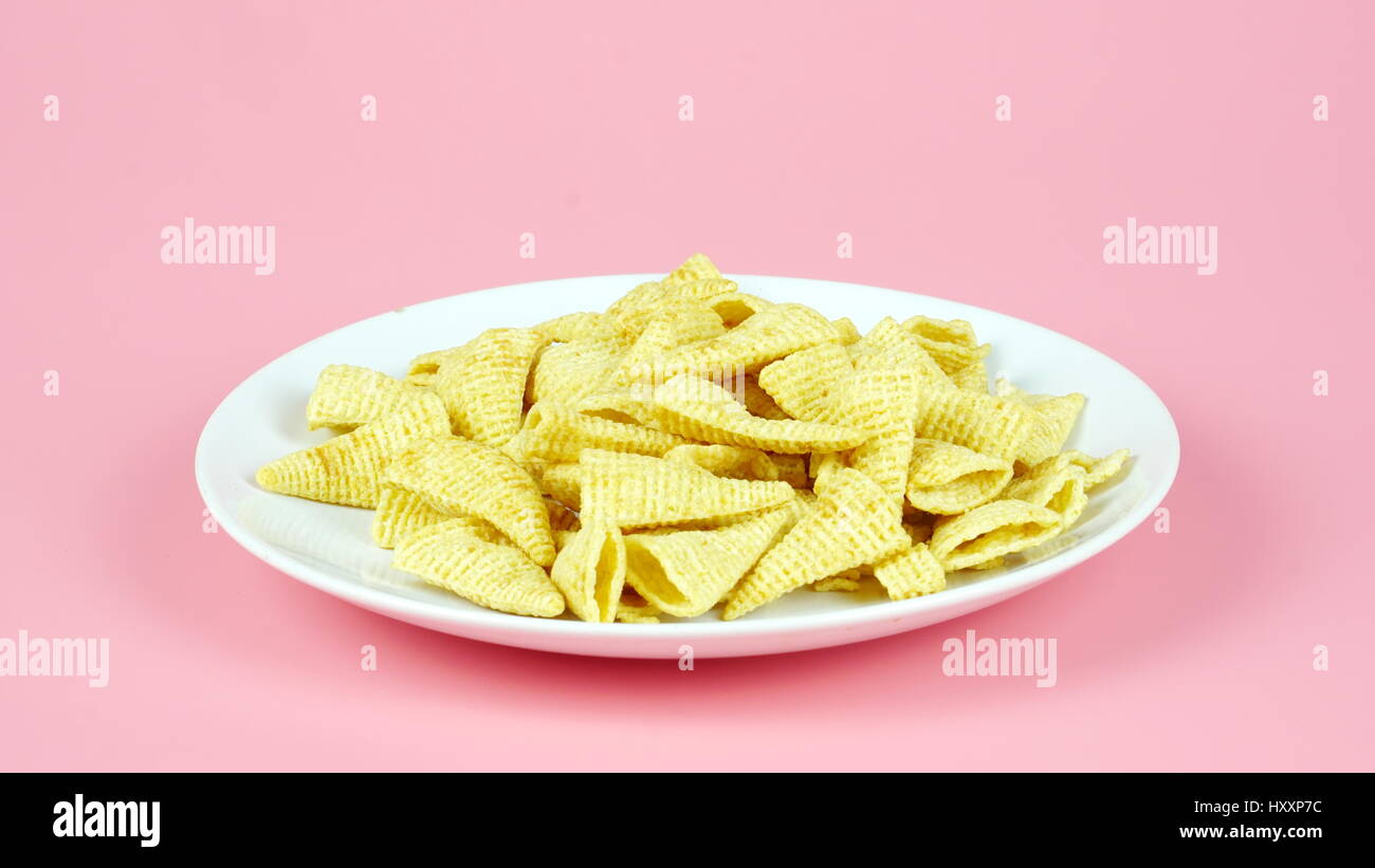 Corn snack, American style. The triangle snack made from some corn ...