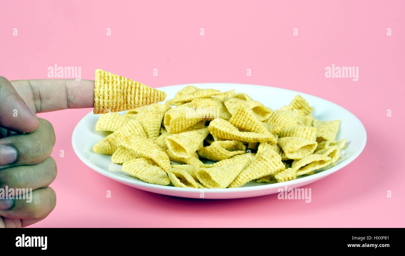 Corn snack, American style. The triangle snack made from some corn ...