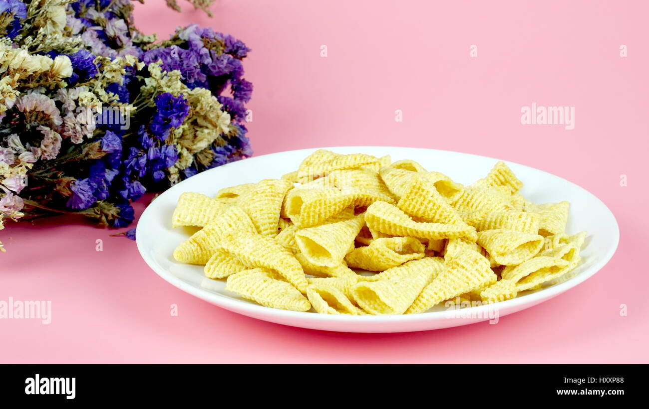 Corn snack, American style. The triangle snack made from some corn ...