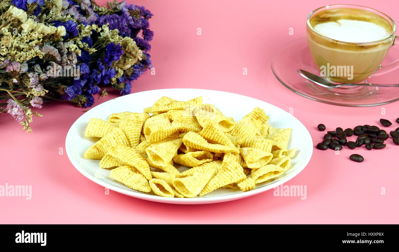 Corn snack, American style. The triangle snack made from some corn ...