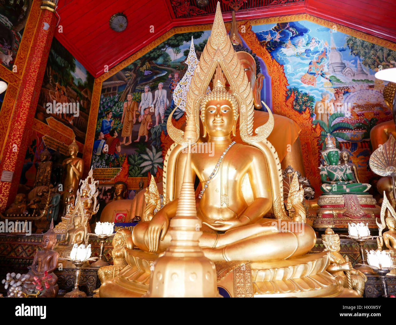Buddha statues inside the Wat Phra That Doi Kham (Temple of the Golden ...