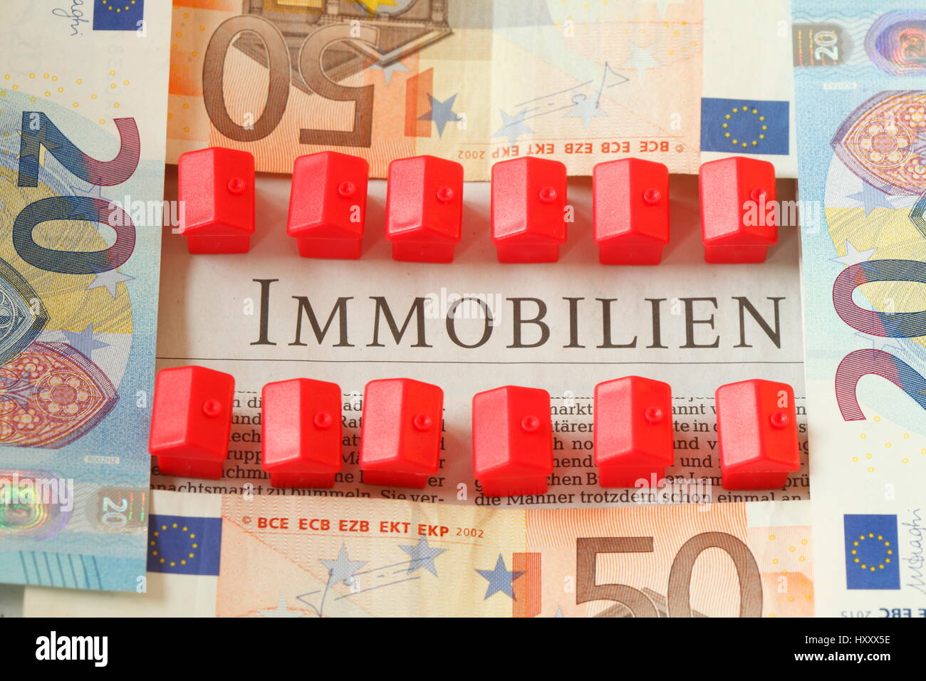 Red toy houses hi-res stock photography and images - Alamy