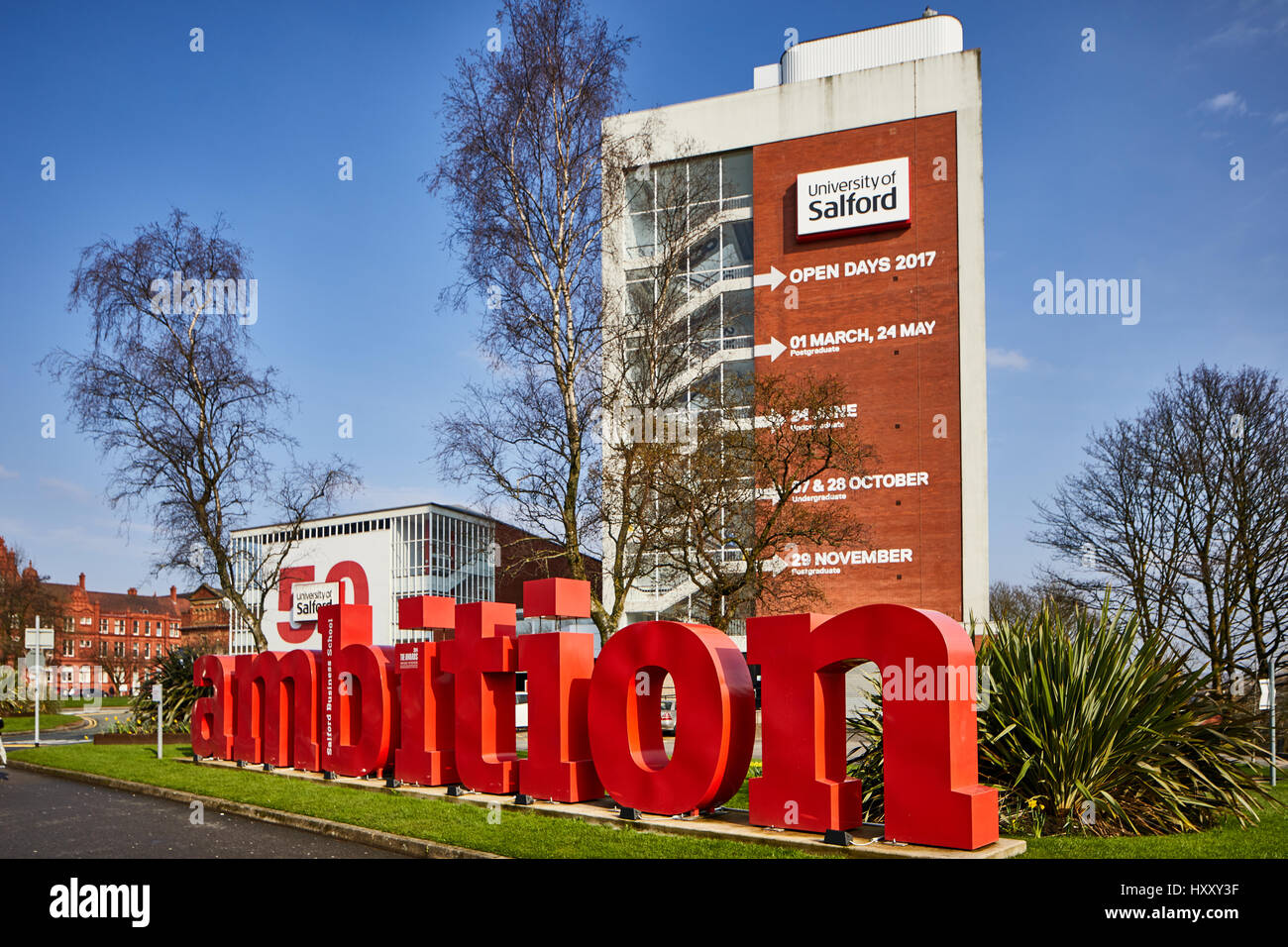 Ambition sign letters on the lawn of Salford University Maxwell Hosue ...