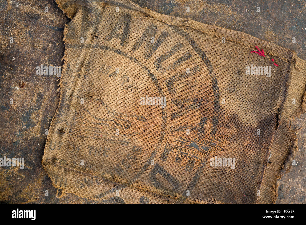 Old dirty hessian sack bag stamped used as upholstery material ...