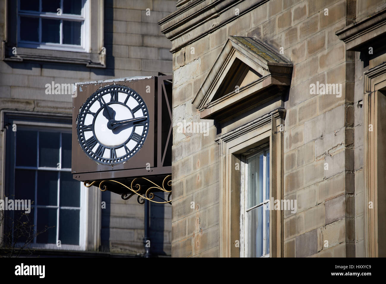 Clock decorating the exterior of an office building Huddersfield town ...