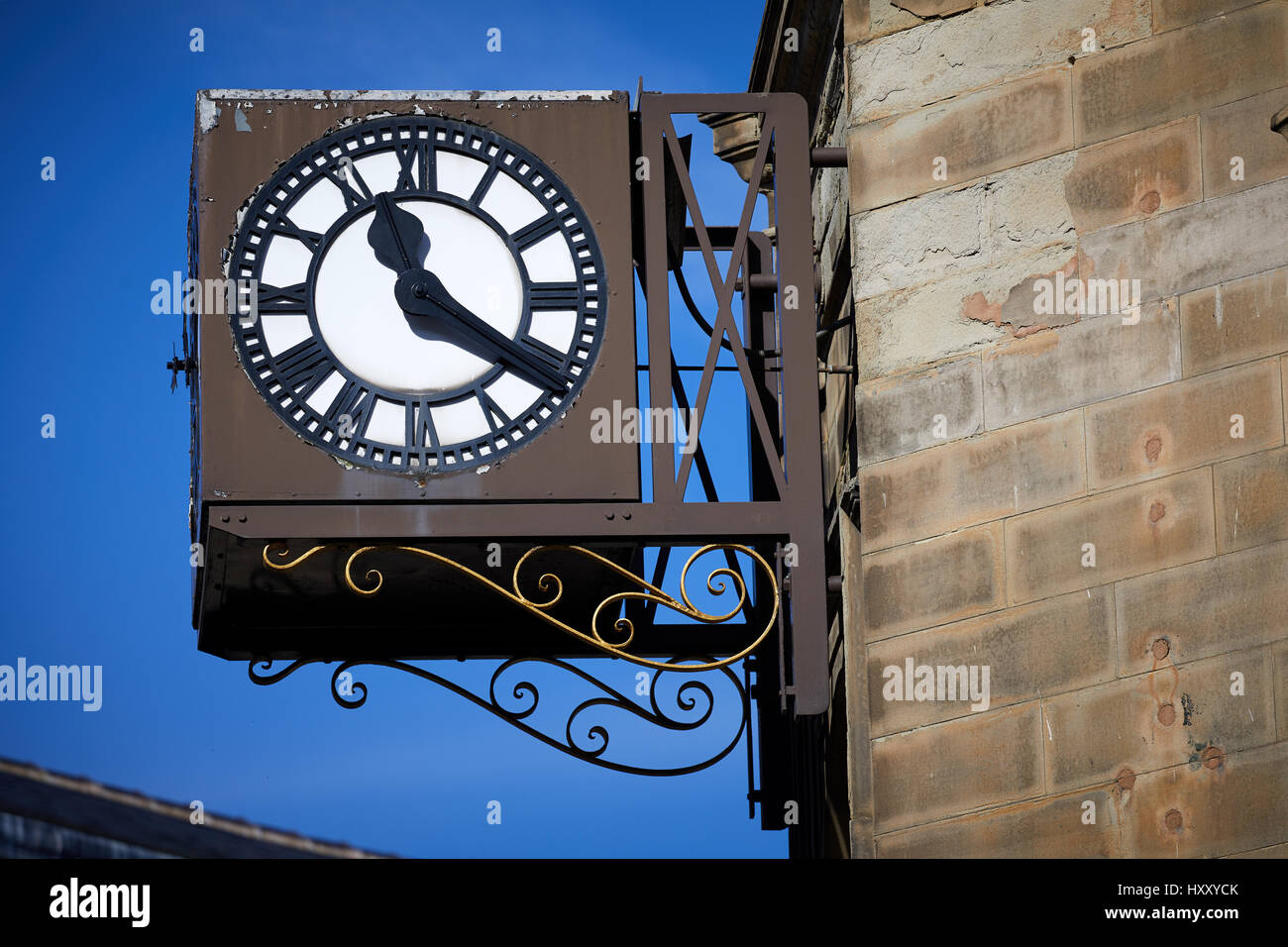 Clock decorating the exterior of an office building Huddersfield town ...