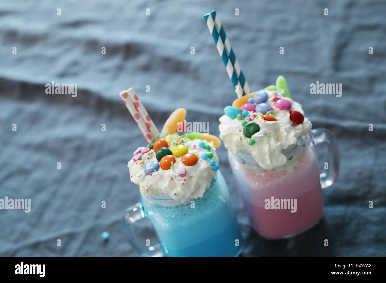 Glass pink milkshake decorated candy hi-res stock photography and ...