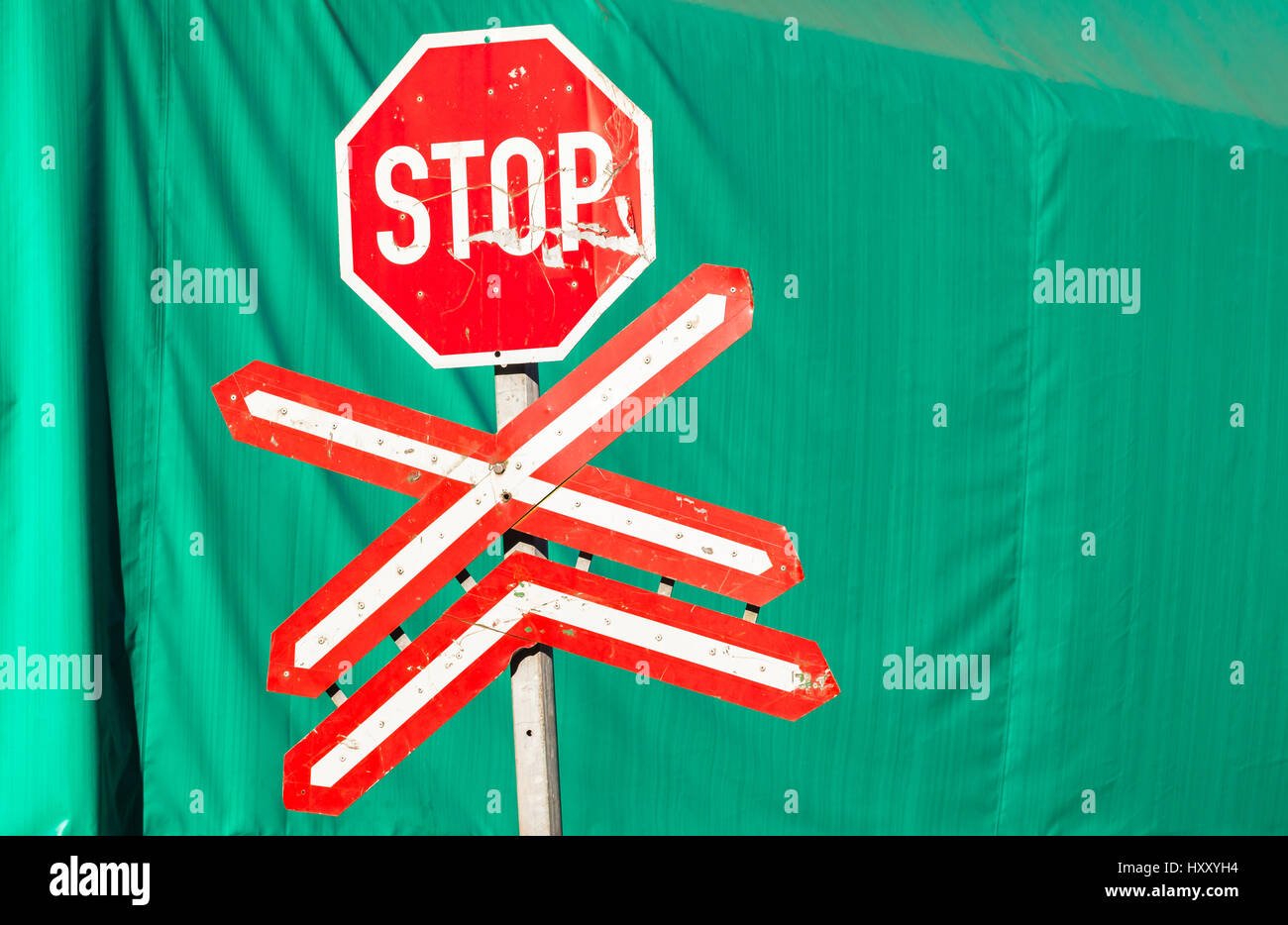 Stop Sign Green Background abstract contrasts train line intersection ...