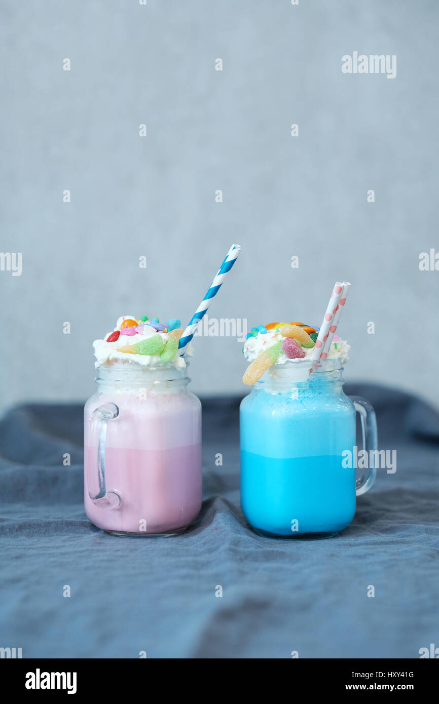 Glass pink milkshake decorated candy hi-res stock photography and ...