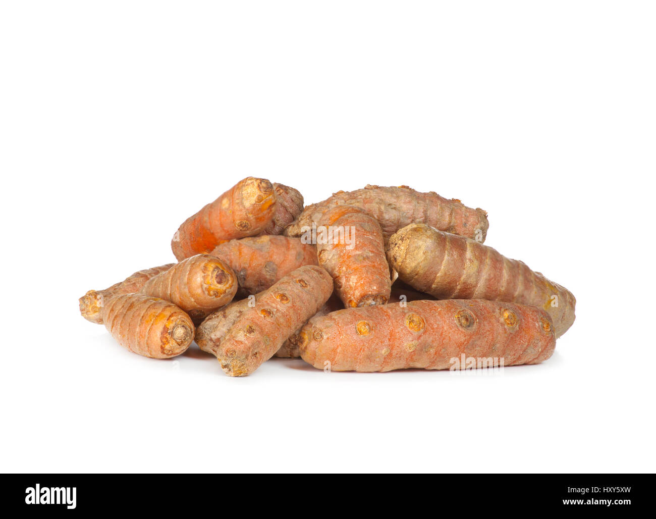 Close up of turmeric roots isolated on white background Stock Photo - Alamy
