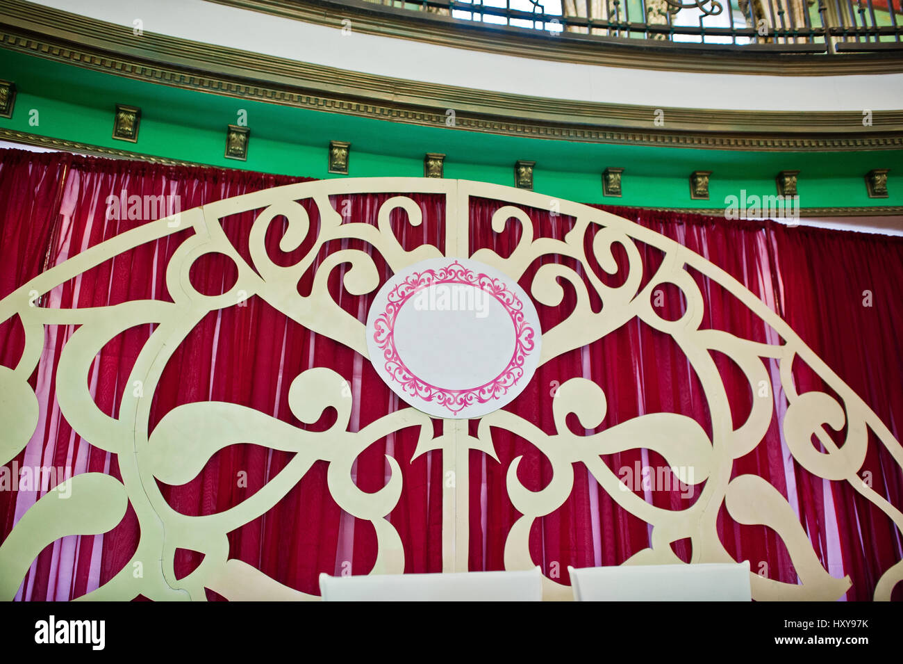 Royal red wedding arch of newlyweds at wedding restaurant Stock Photo ...