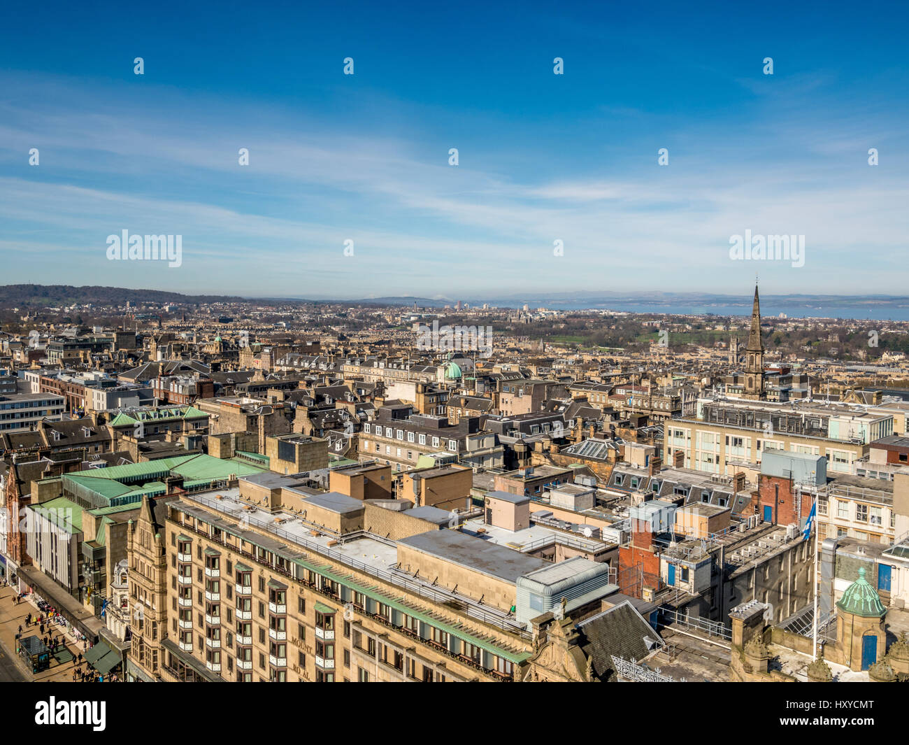 Aerial view across Edinburgh rooftops towards The Firth of Forth ...
