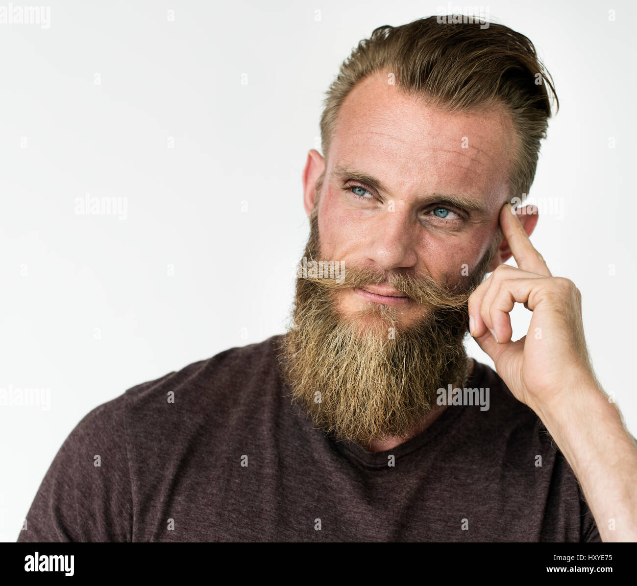 Adult guy thinking hand gesture portrait Stock Photo - Alamy