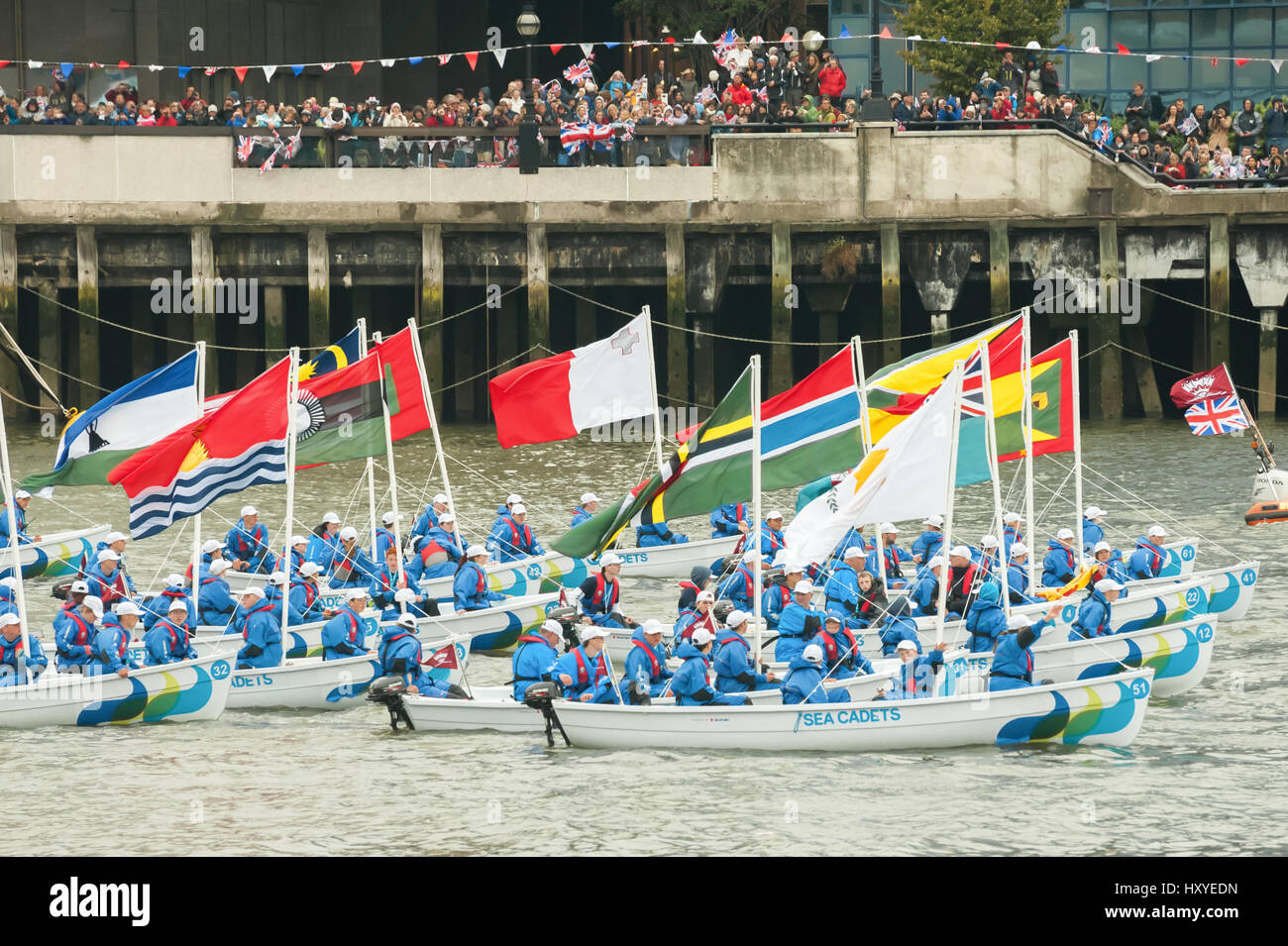LONDON, UK - JUNE 3: Member of the Sea Cadets flying flags of the ...